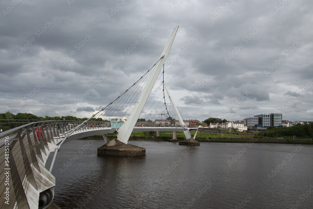 The Peace Bridge is a footbridge over the River Foyle in Derry ...
