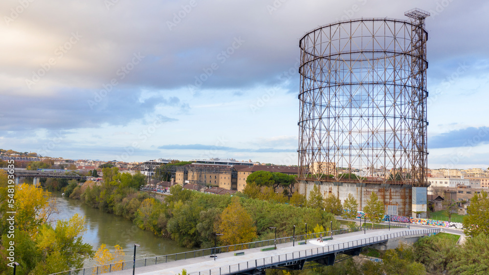 Aerial view at sunset of the Gasometer in the Ostiense district in Rome ...