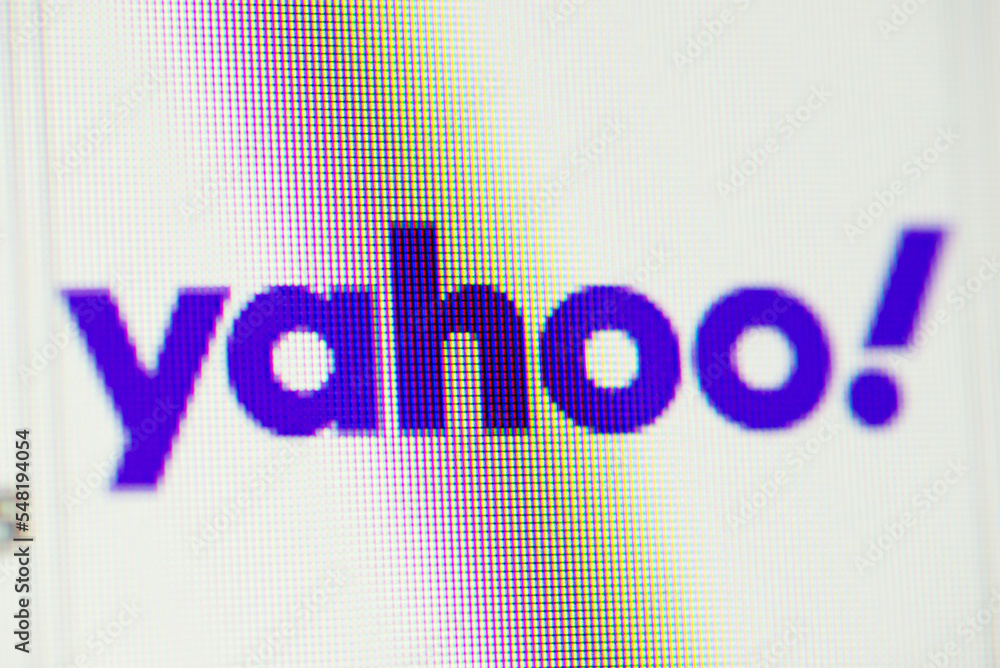 Yahoo! logo on screen of computer. Internet services corporation brand ...