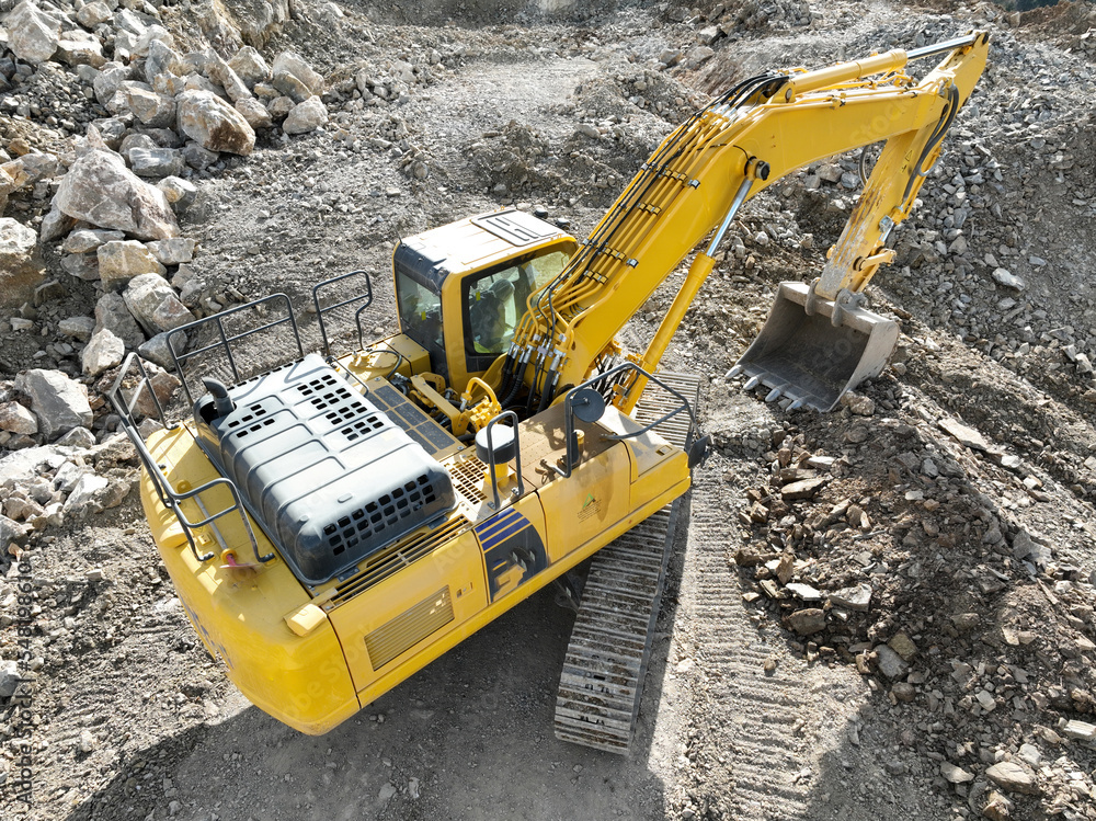 Industrial mine excavators are digging the soil in the construction ...