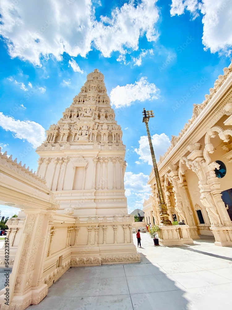 Vertical shot of historic Karya Siddhi Hanuman Hindu Temple on a sunny ...