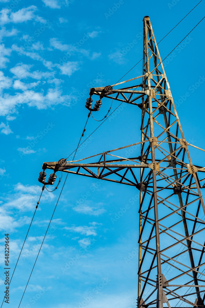 Countryside electric power transmission line on the background of the ...