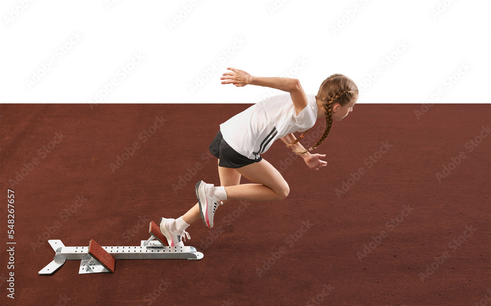 Young athlete, beginner female track runner bursting off starting block ...