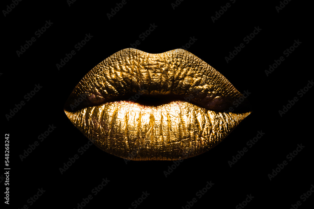 Golden lips isolated on black background. Clipping path gild lips ...