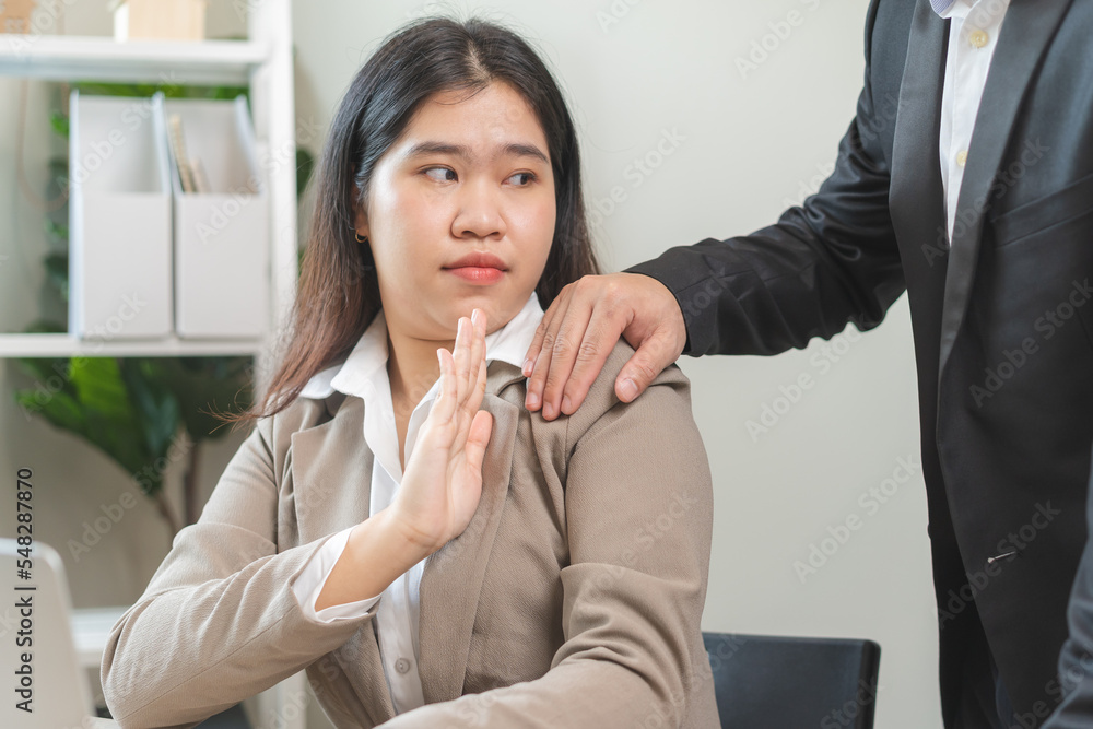 Unhappy, disgusted asian young employee, business woman defending hand ...