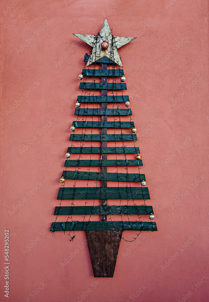 Handmade Craft Christmas Tree Made From Wooden Planks And Illuminated handmade-craft-christmas-tree-made-from-wooden-planks-and-illuminated