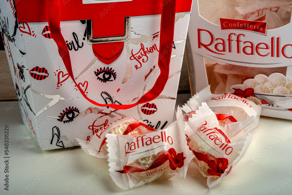 Big box with Raffaello chocolates: Raffaello candies on beige ...