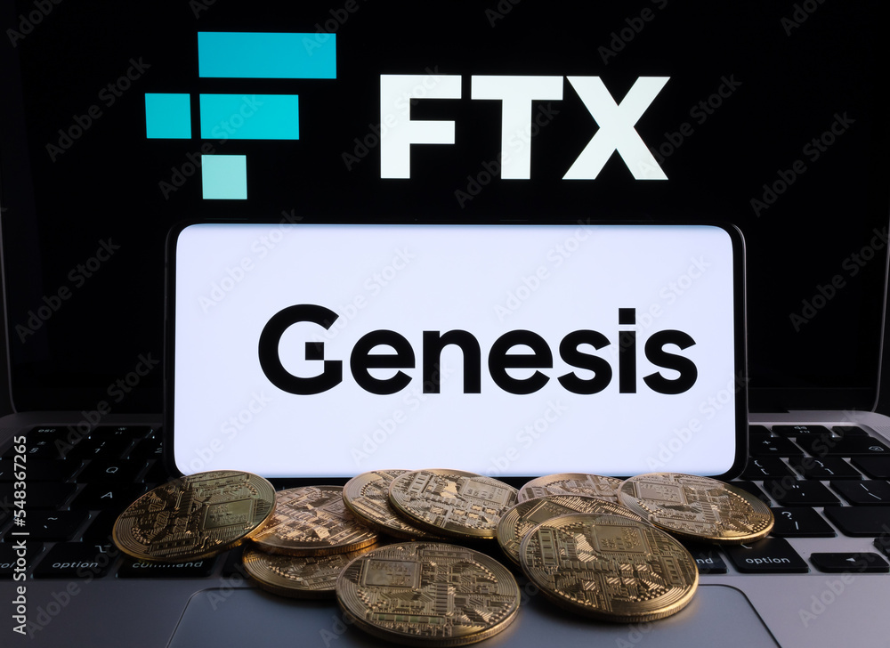 FTX and Genesis concept. Genesis Trading crypto company logo seen on a ...