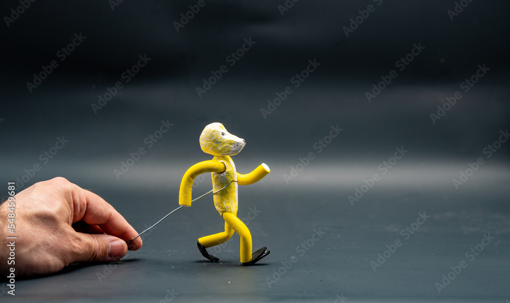 Stopmotion process of walking. Third step. Man's hand holding with an ...