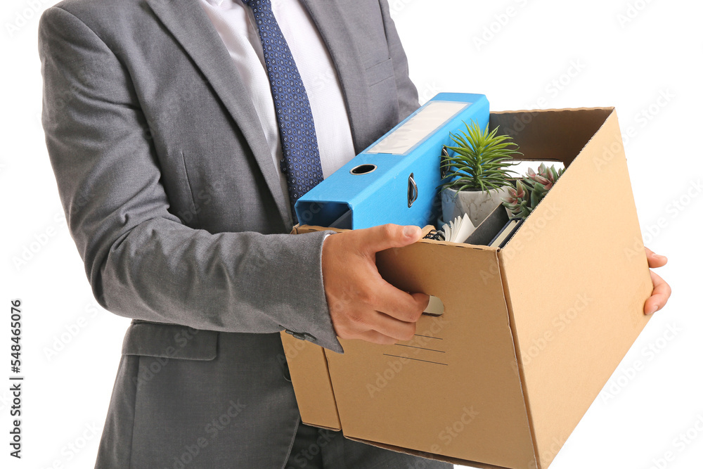 Fired young man holding box with personal stuff on white background ...