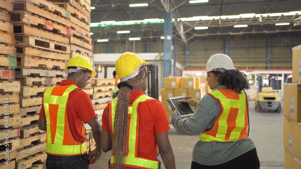 Fotografia do Stock: Teamwork of black workers and fat woman working in ...