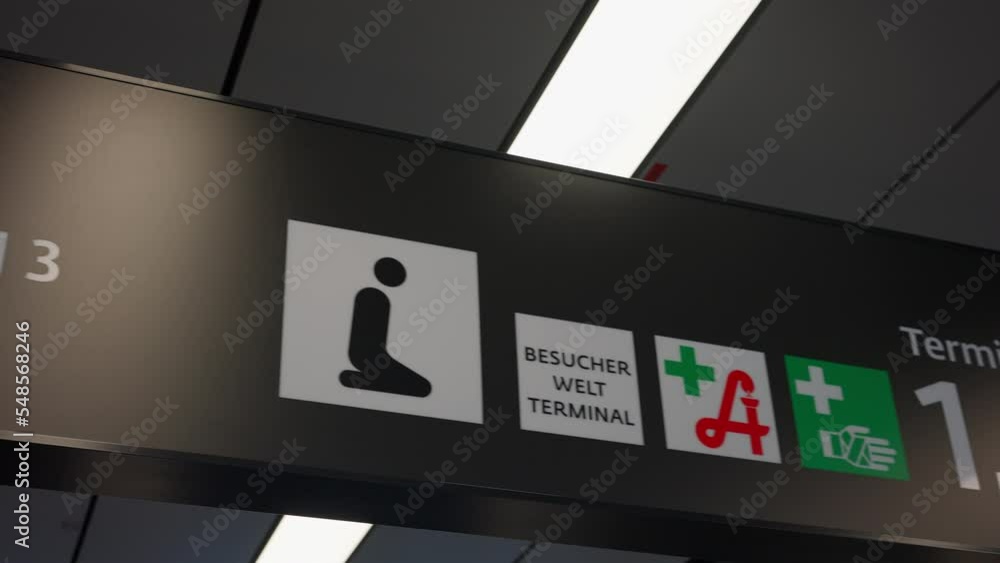 Panning View Of A Directional Signage In A Dubai Airport Terminal Stock ...