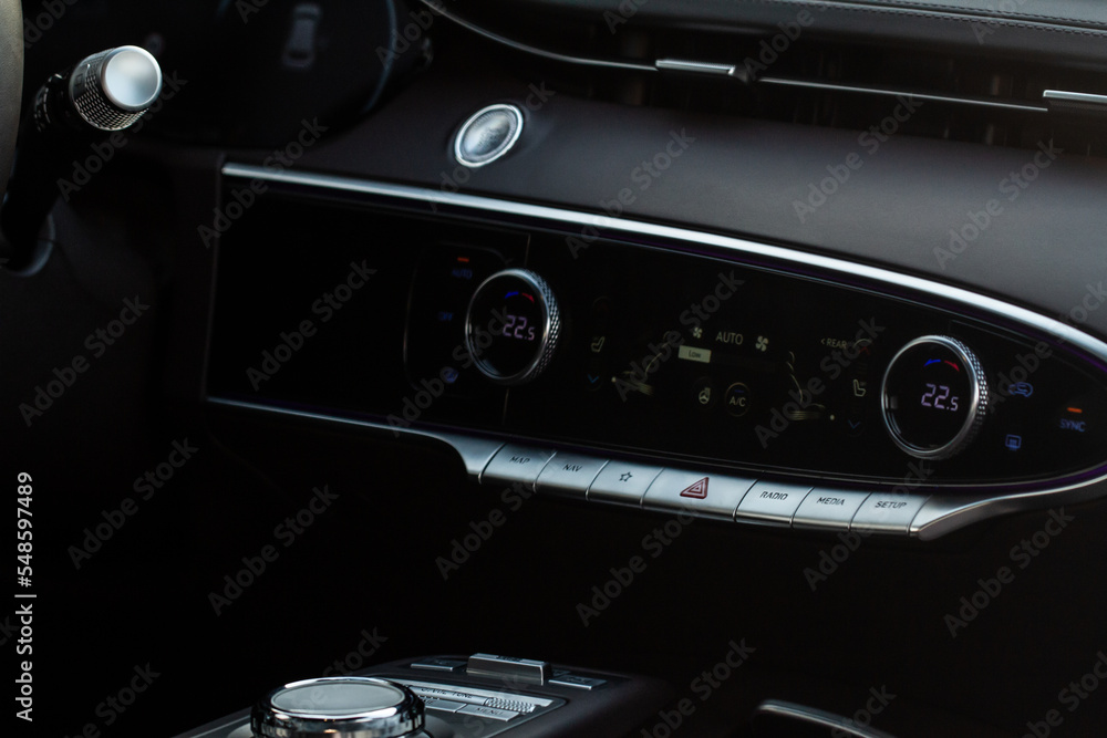 Foto de Car air conditioner dashboard. Modern car interior. Adjustable ...