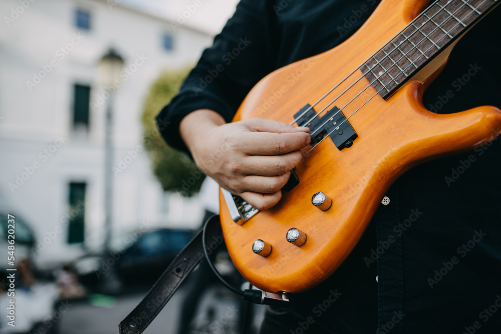 Man Playing Bass Guitar Stock Photo | Adobe Stock