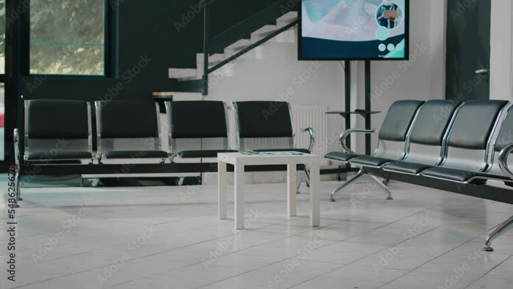 Empty hospital reception space with waiting room chairs, waiting area ...