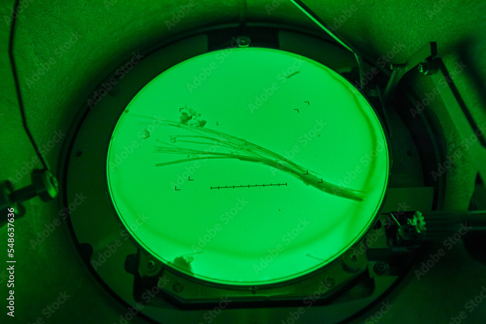 Microscopic particles seen on the screen of a transmission electron ...