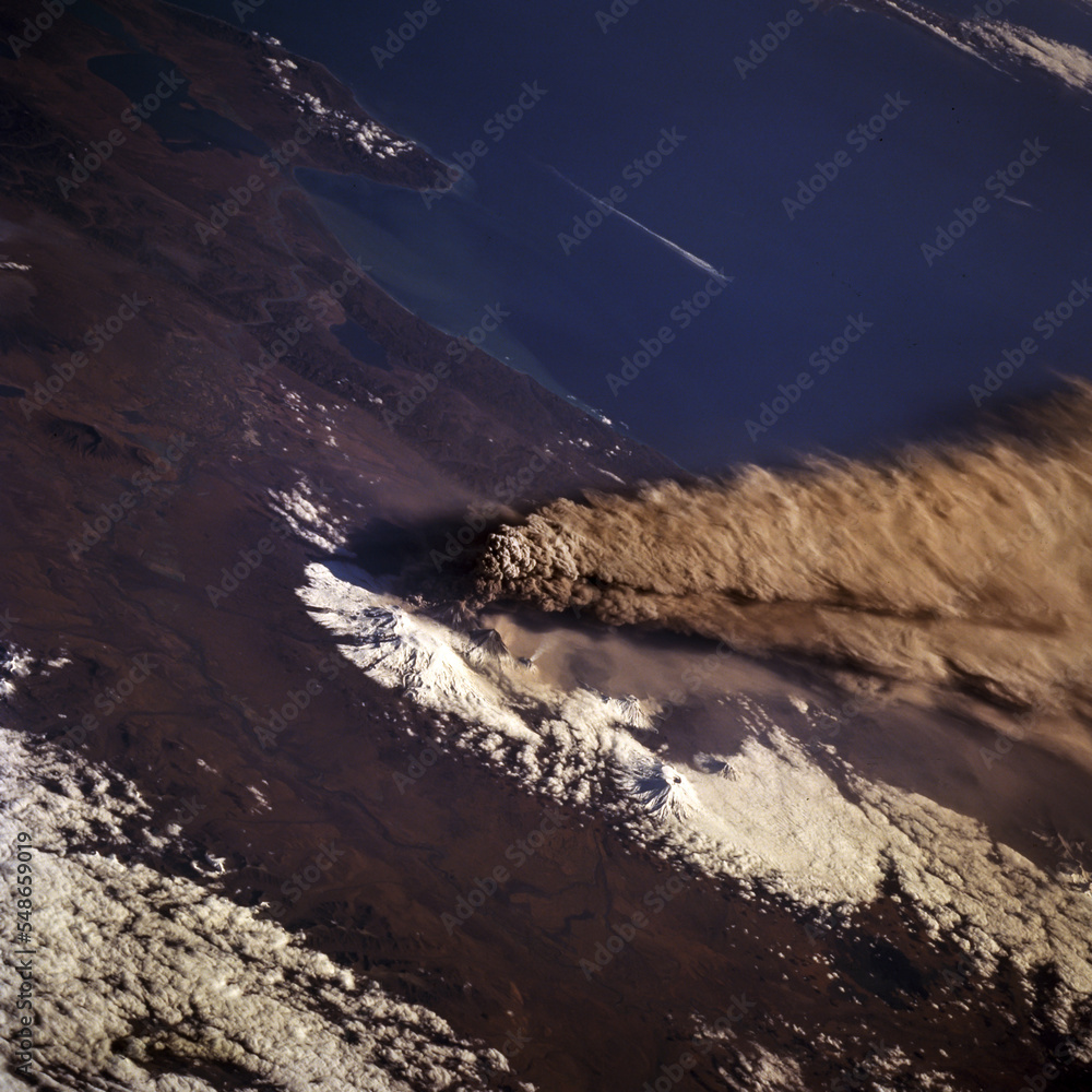 Aerial view from above of the Klyuchevskaya Volcano erupting. Digitally ...