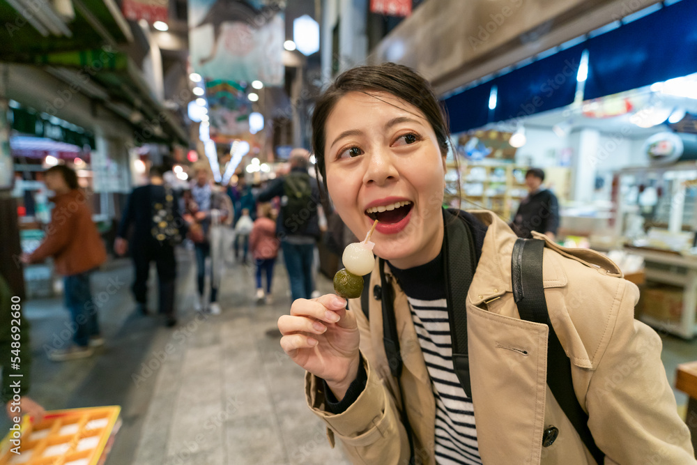 happy asian Taiwanese woman traveler looking away into distance with ...