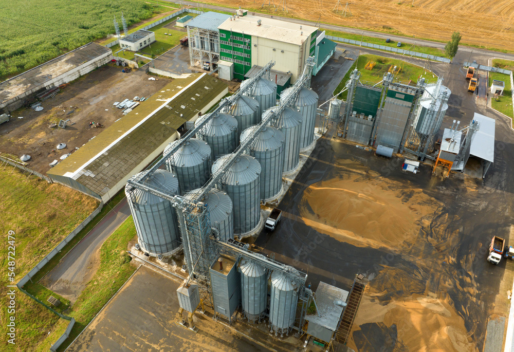 Fotka „Silo storage at farm. Elevator for storage siliage and grain ...