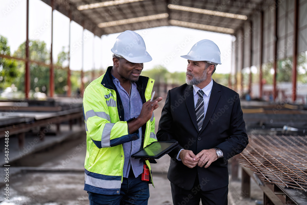 At construction site manager meet engineer check precast concrete slabs ...