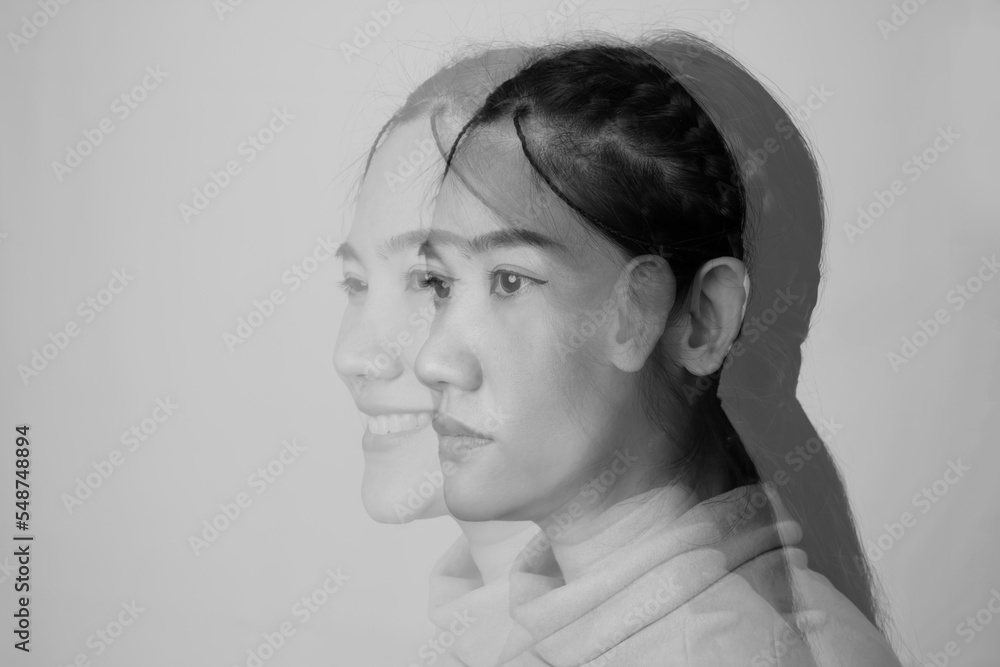 Double exposure of close-up of asian beautiful woman who internally ...