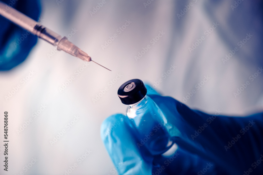 Medical hand glove blue vial vaccine hypodermic needle syringe ...
