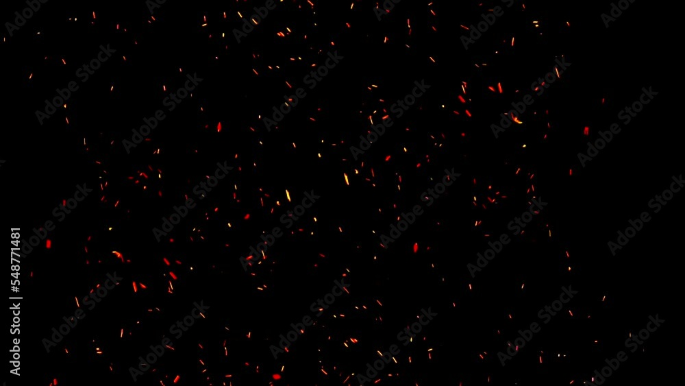 Explosive hot glowing ember sparks from the bottom and top of the frame ...