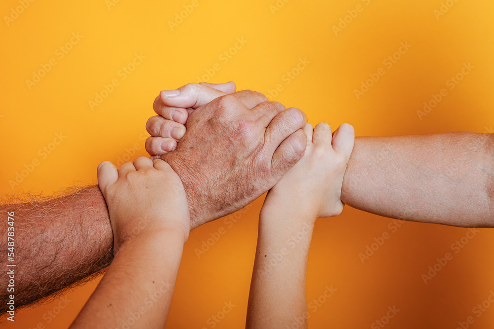 Crop multi generational people holding hands Stock Photo | Adobe Stock