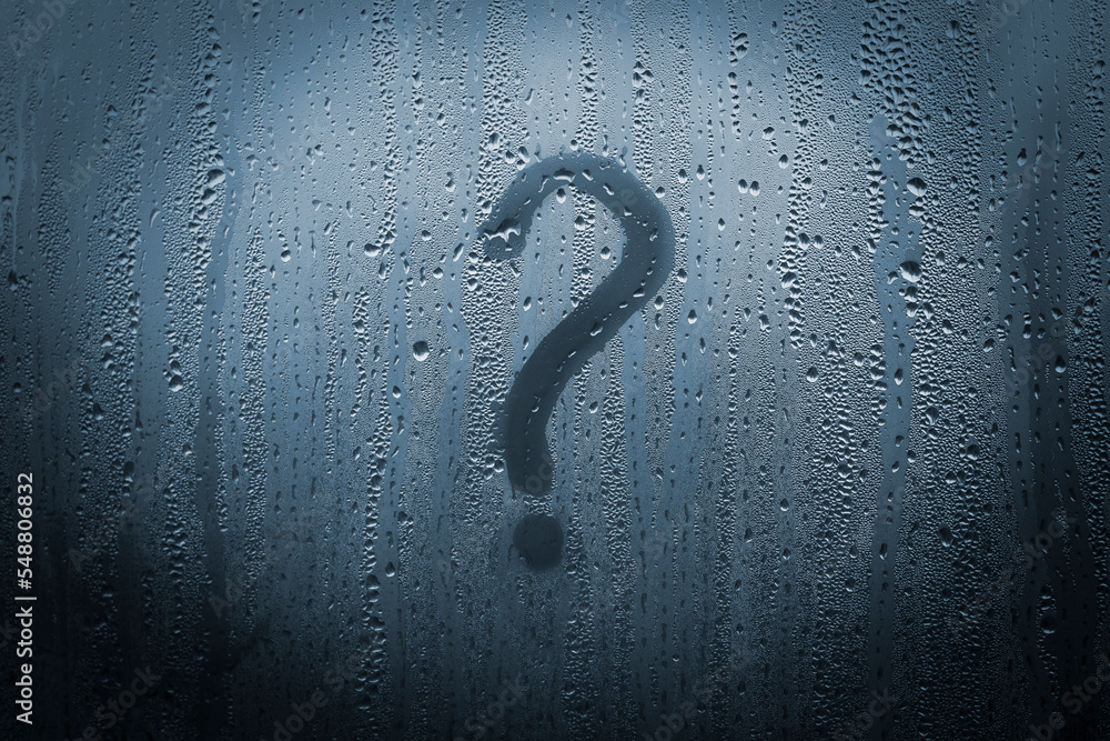 a question mark on a fogged window, a question mark drawn on a window ...