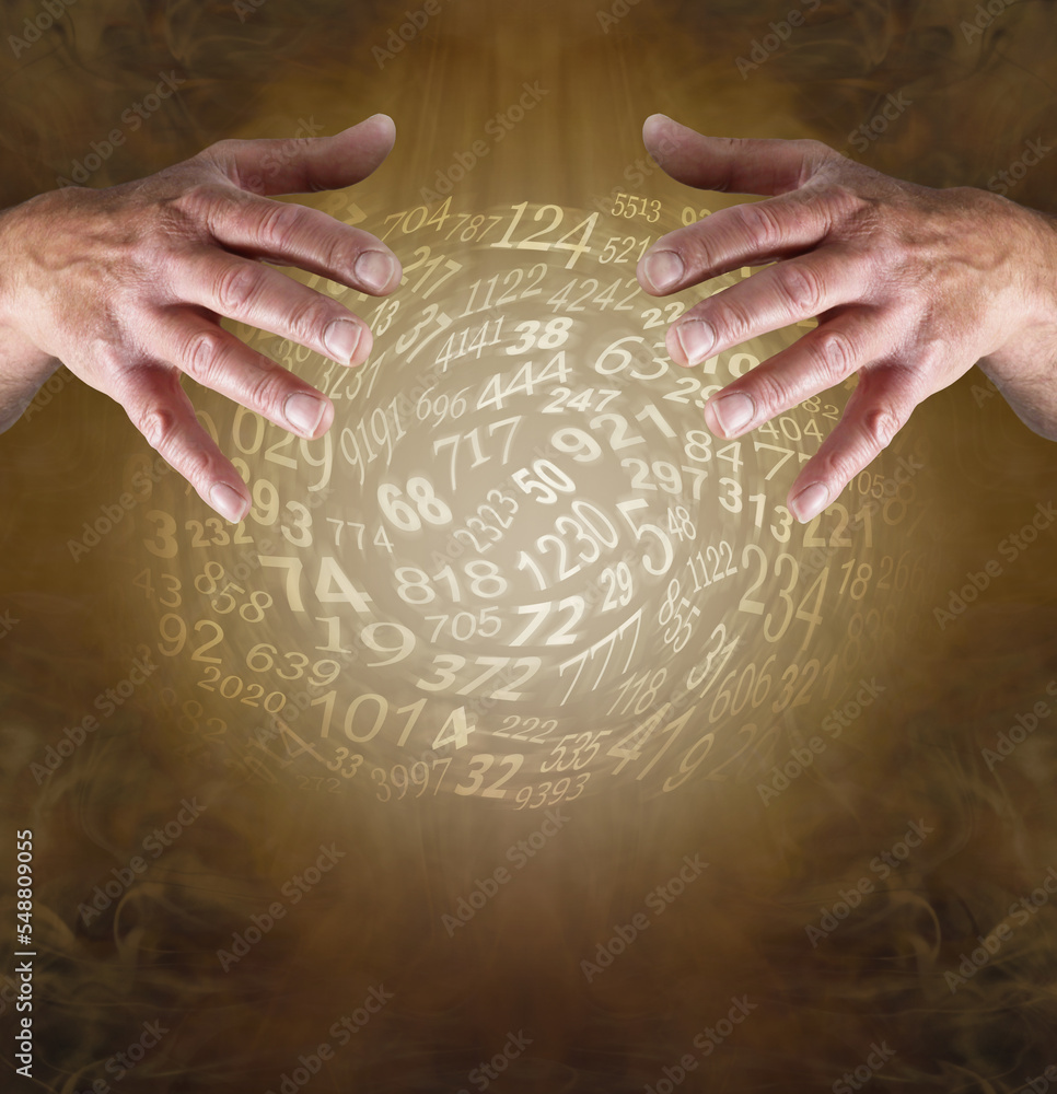 Numerologist with magical circle of swirling numbers - male hands ...