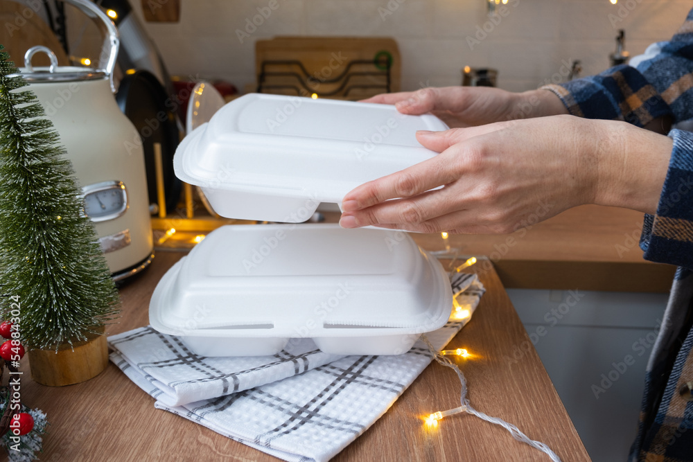 Food delivery service containers on table white scandi festive kitchen ...