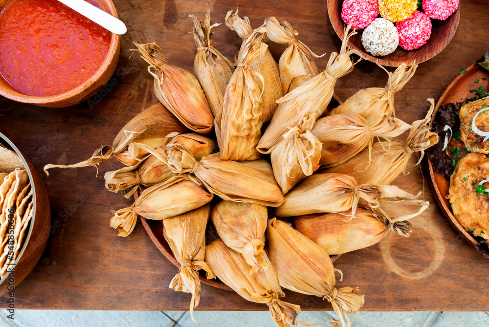 Small tamales called Chuchitos, typical Guatemalan food, made of corn ...