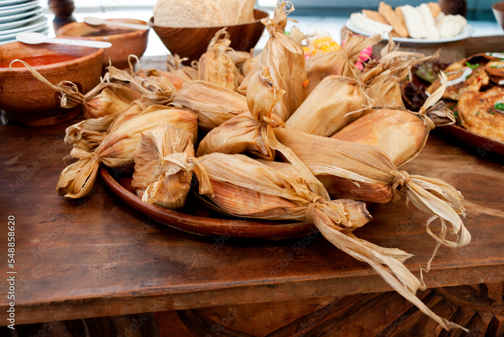 Small tamales called Chuchitos, typical Guatemalan food, made of corn ...