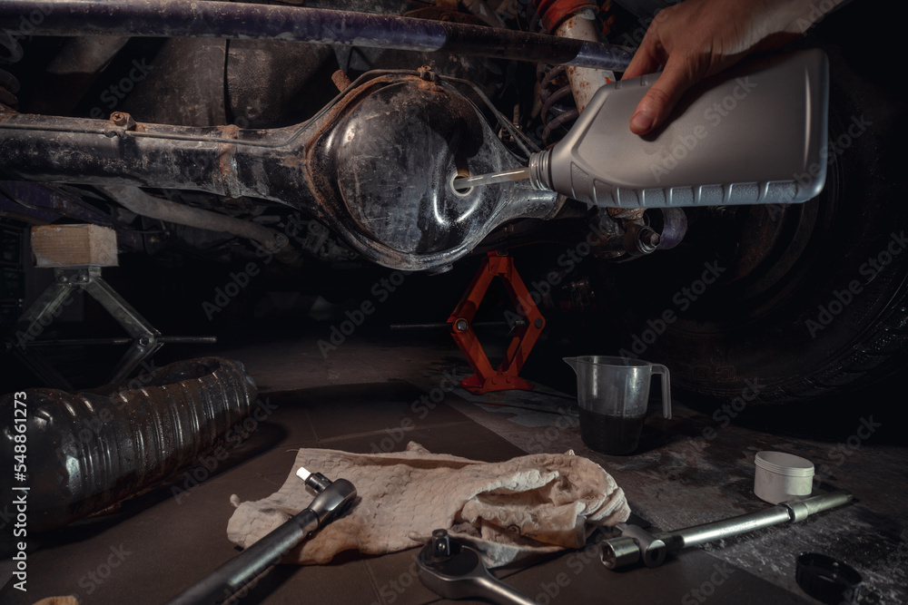 Changing the oil in the front differential of an off-road vehicle ...