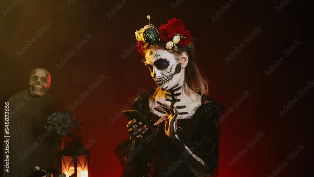 Young creepy model using mobile phone to browse internet website over ...