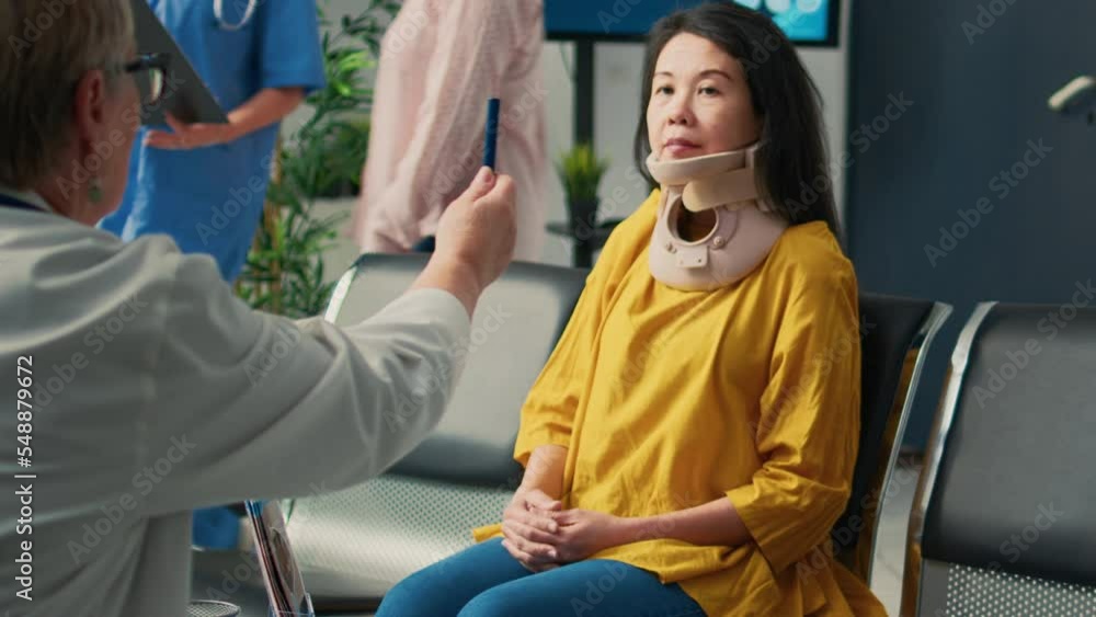 Senior doctor doing concussion examination for patient with cervical ...