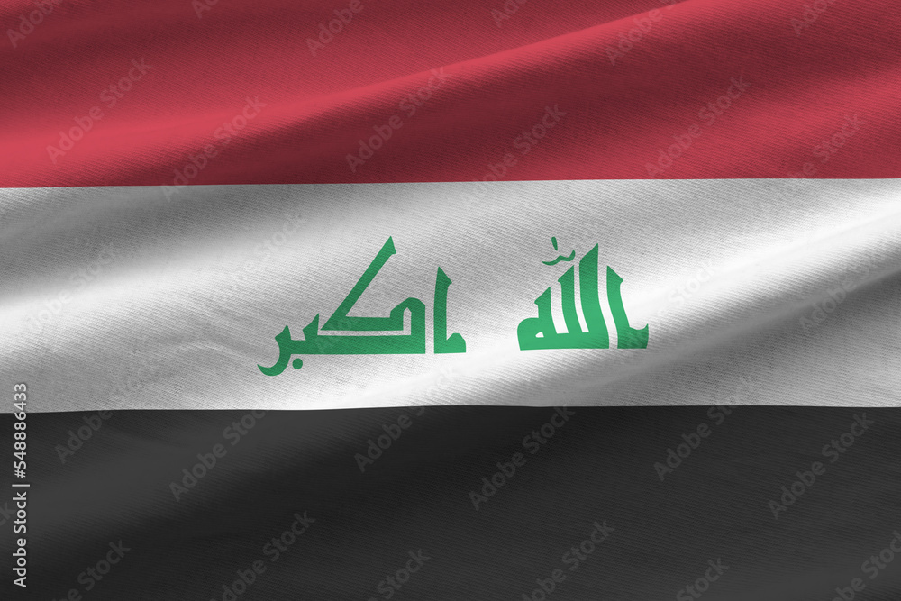 Iraq flag with big folds waving close up under the studio light indoors ...