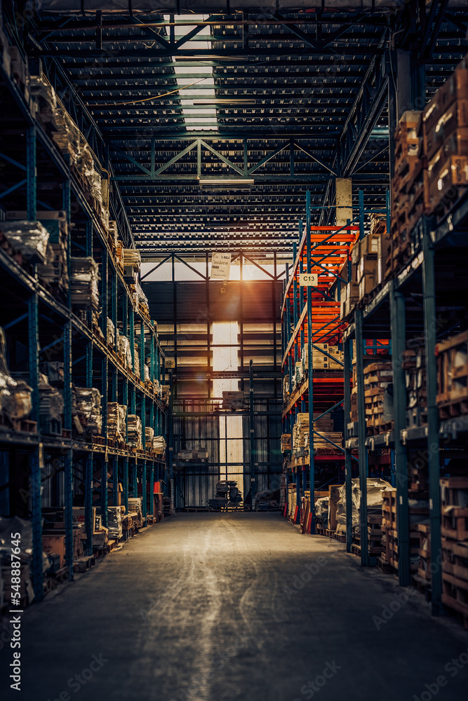 interior of modern retail warehouse storage with pallet trucks near ...