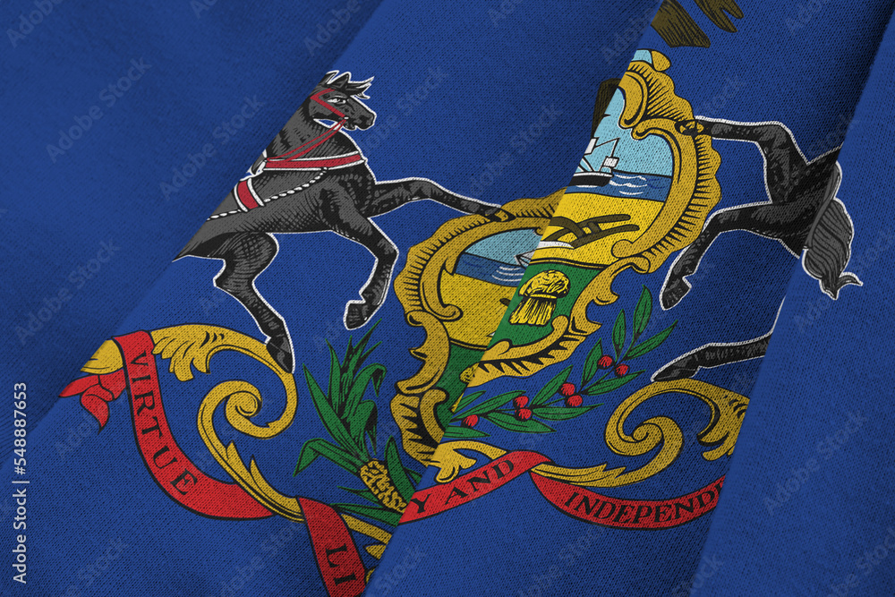 Pennsylvania US state flag with big folds waving close up under the ...