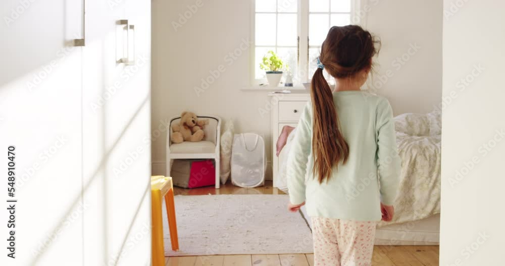 Jumping on the bed, waking up and morning with a girl walking in a ...