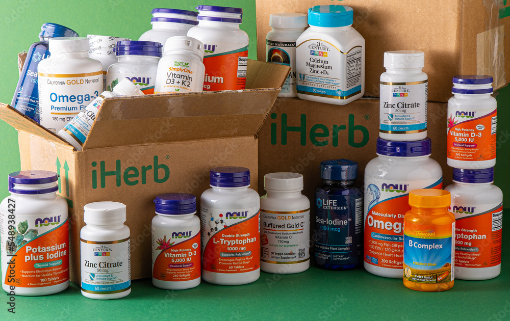 Vitamins, minerals and micronutrients from iHerb box. Lots of different ...