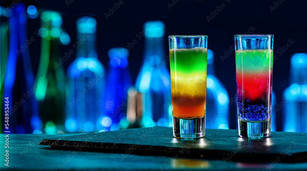 Cocktails Party Shots and Shooters on bar counter in a restaurant, pub ...