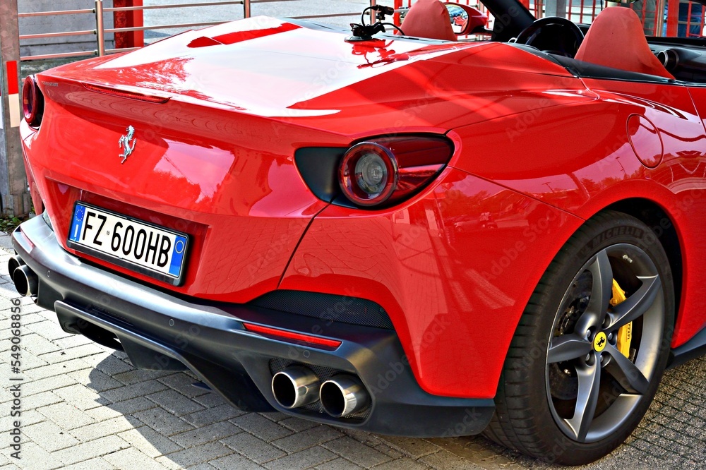 red Ferrari luxury car display parked in Maranello, Modena, Italy Stock ...