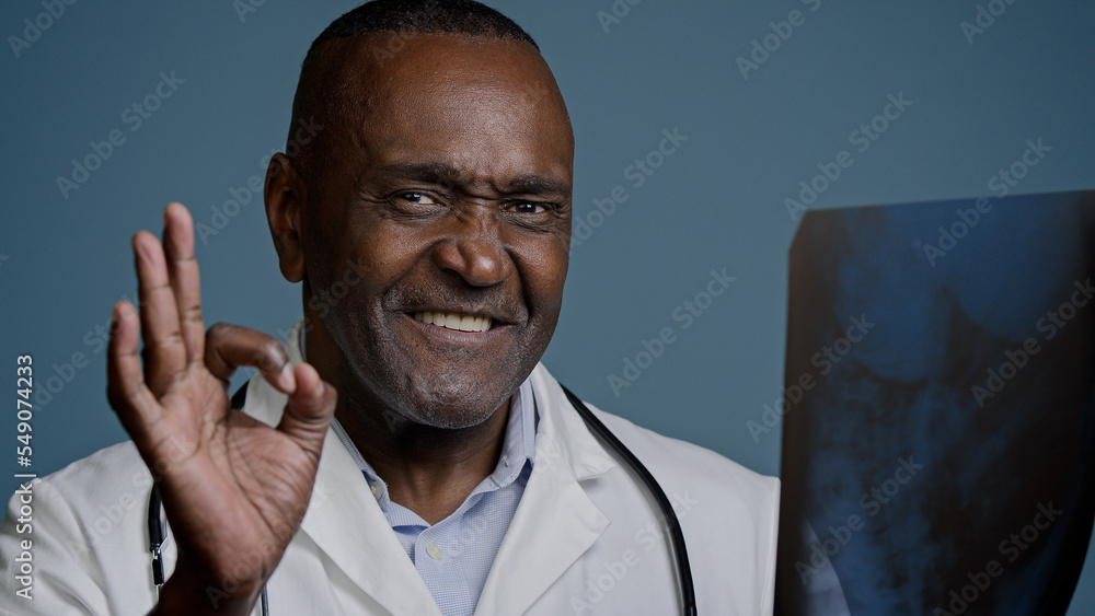 Close-up serious pensive focused doctor radiologist traumatologist ...