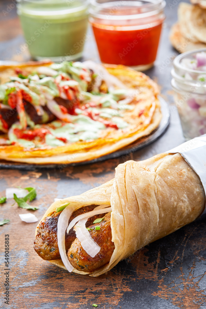 Chicken Seekh Kebab paratha roll kathi shawarma wrap with dipping sauce ...