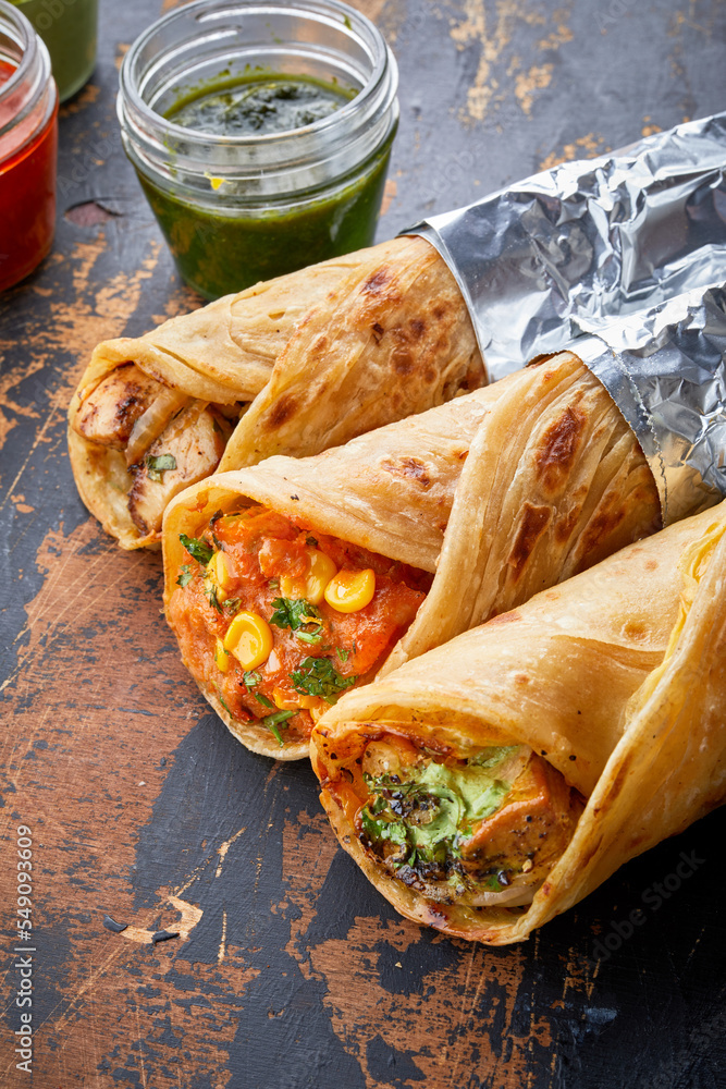 Assortment of wraps Reshmi Tikka, Aloo Corn or potato Corn and Chicken ...