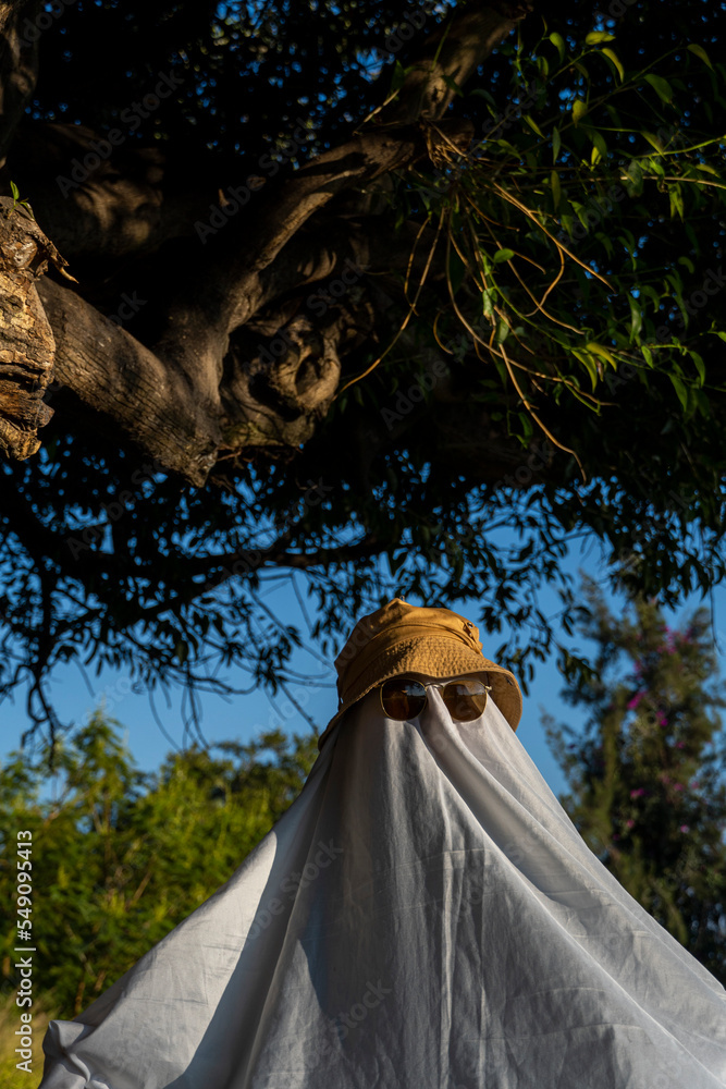 Celebrating halloween. Ghost Challenge 2021. A man dressed as a ghost ...