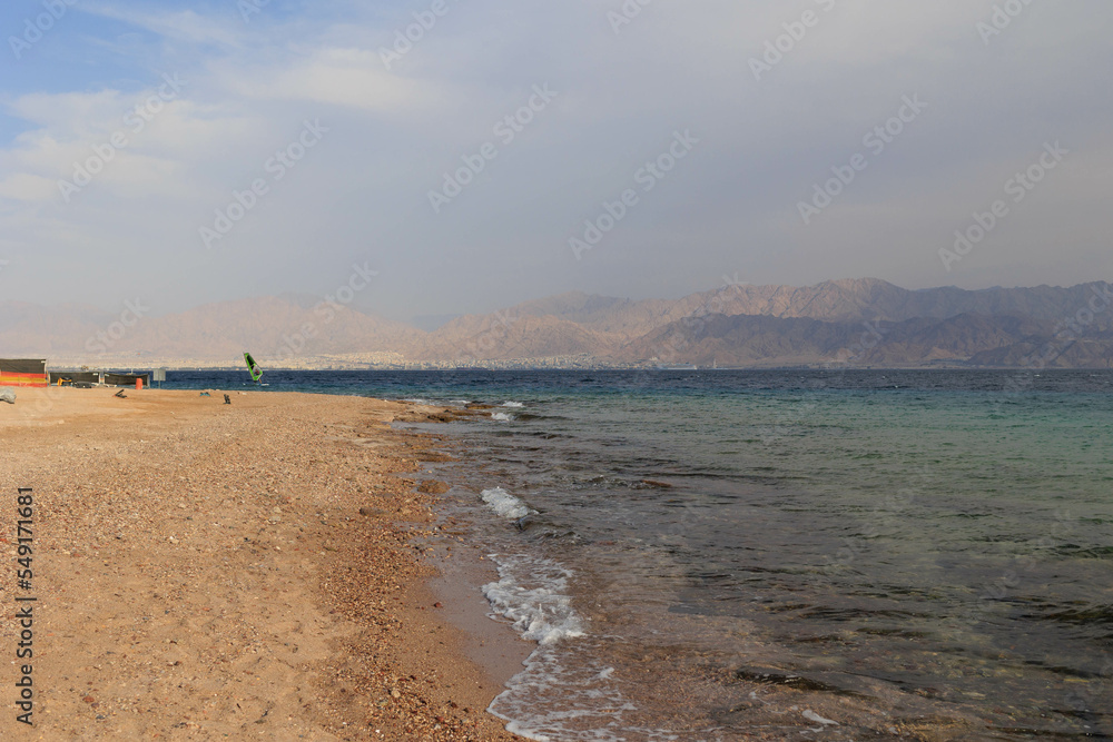 On the shores of the Red Sea in the Gulf of Aqaba on the border of ...