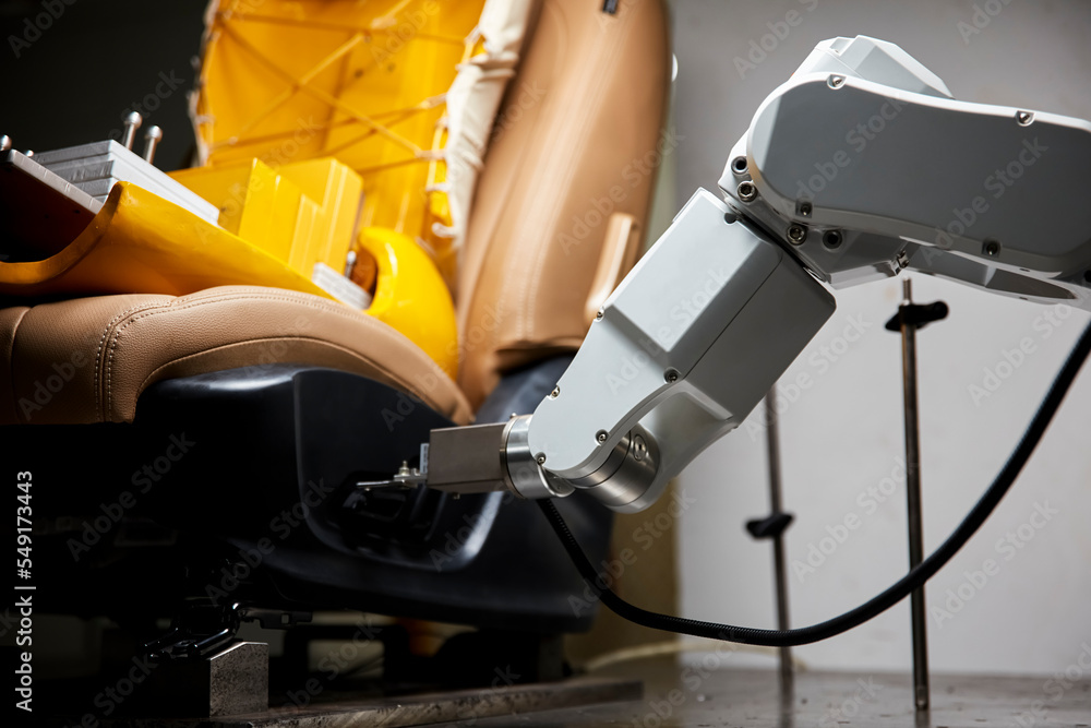 The robot of automotive installation of a car seat is at work Stock ...