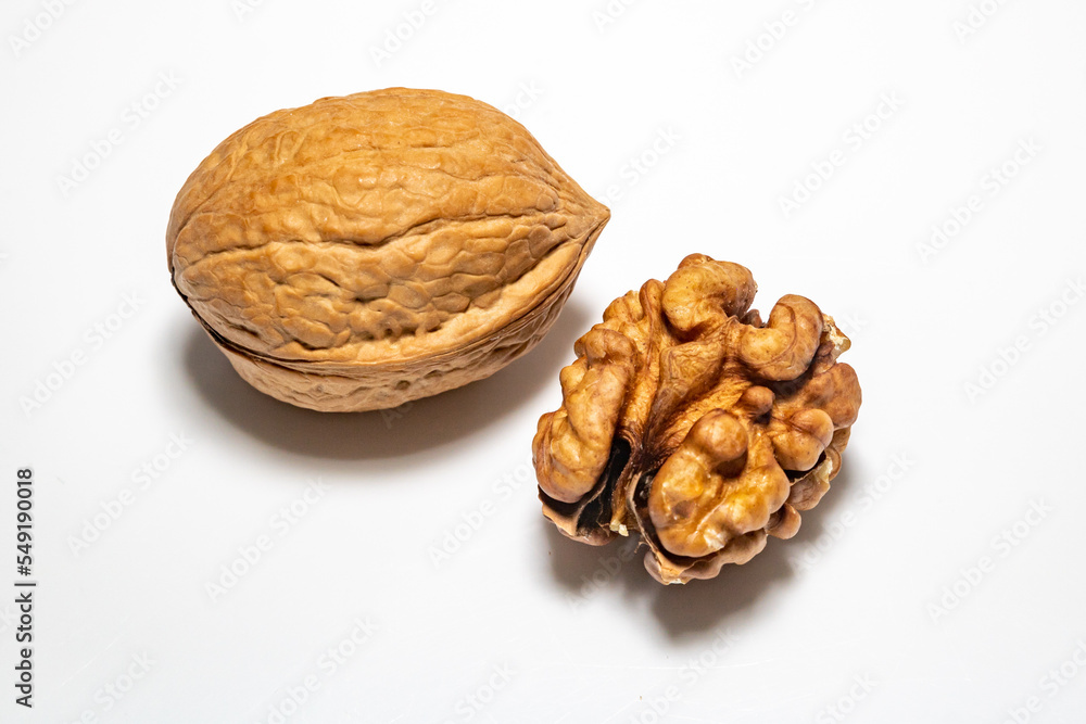 Walnut, European walnut (Juglans regia L.) open and closed, isolated on ...